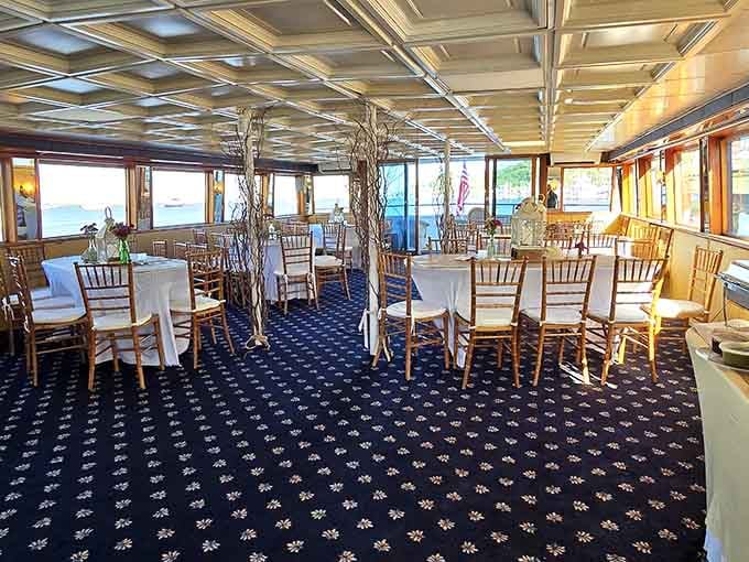 Formal dining meets nautical charm in an interior that photographs better than most people's living rooms.