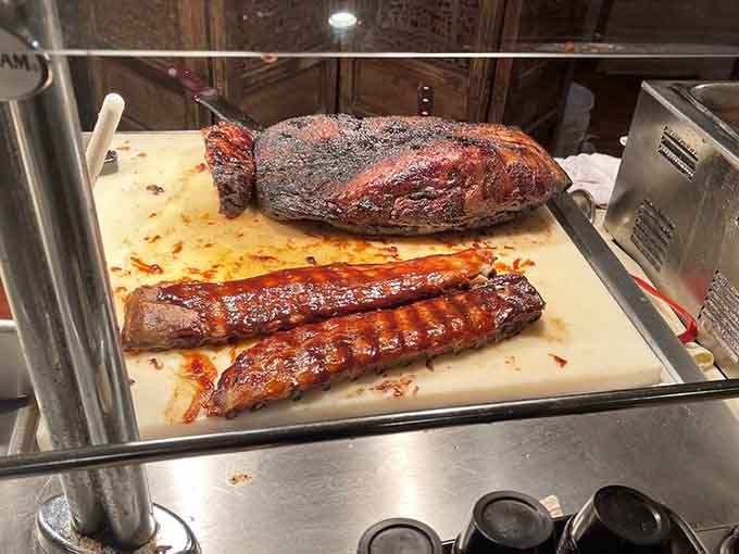 That's prime rib, baby back ribs, and brisket sharing space like the holy trinity of meat lovers everywhere.