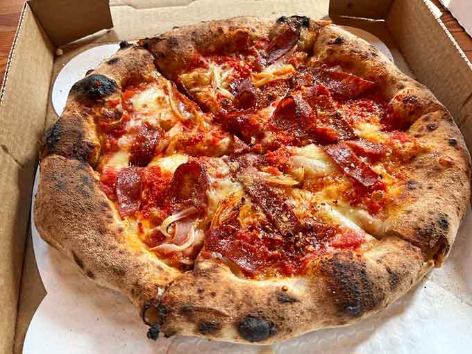 When hot soppressata meets that charred crust, you're looking at pizza that understands the assignment and aces the final exam.