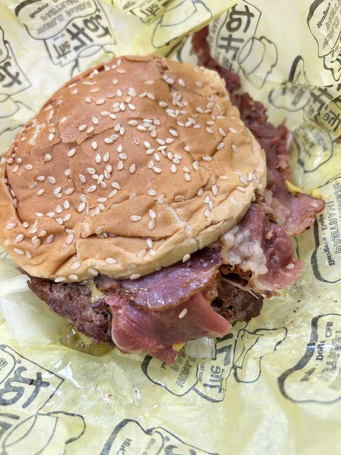 The pastrami burger combines two beloved proteins into one magnificent creation that defies all dietary logic beautifully.