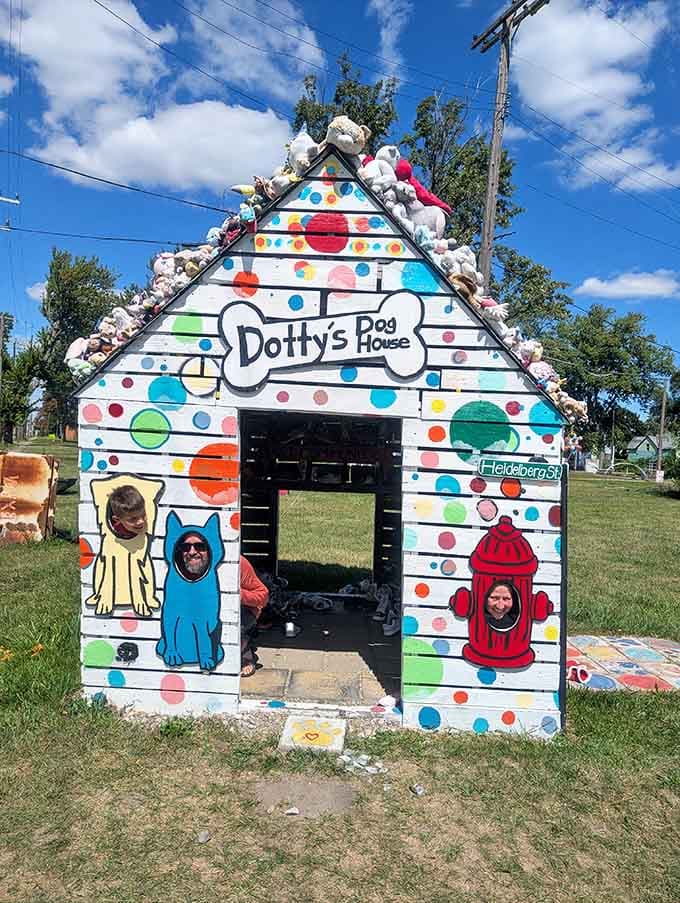 Dotty's Dog House proves that even canine architecture deserves polka dots, bright colors, and a crown of plush toys.