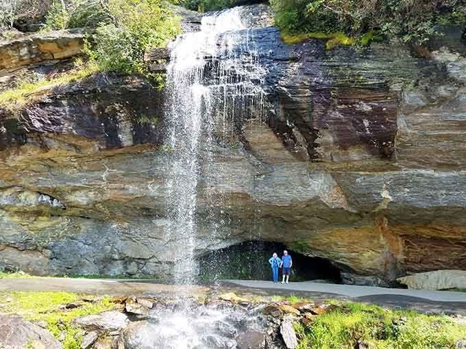 Behind the waterfall is where you realize your rain jacket was optimistic at best, delusional at worst.