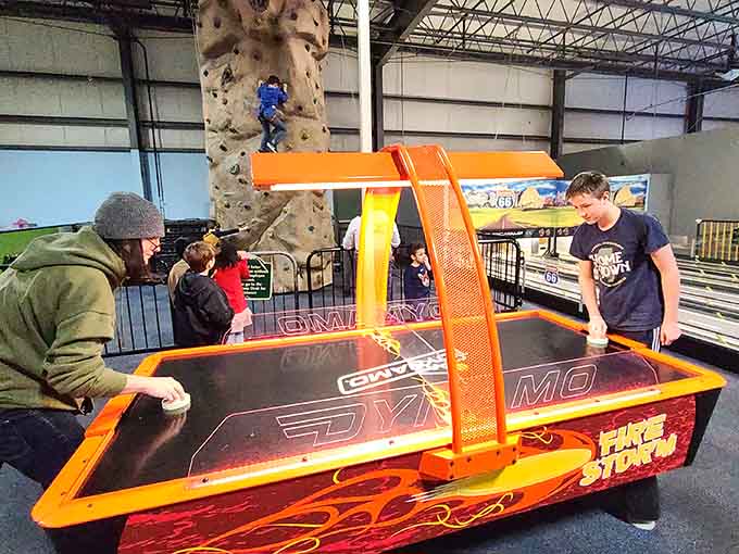 Air hockey: where family rivalries are born and trash talk becomes an Olympic-level sport for all ages.