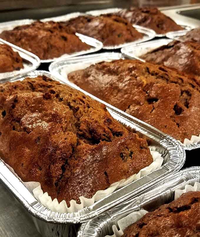 Fresh-baked zucchini bread in individual loaves, because sometimes vegetables taste better when they're disguised as dessert.