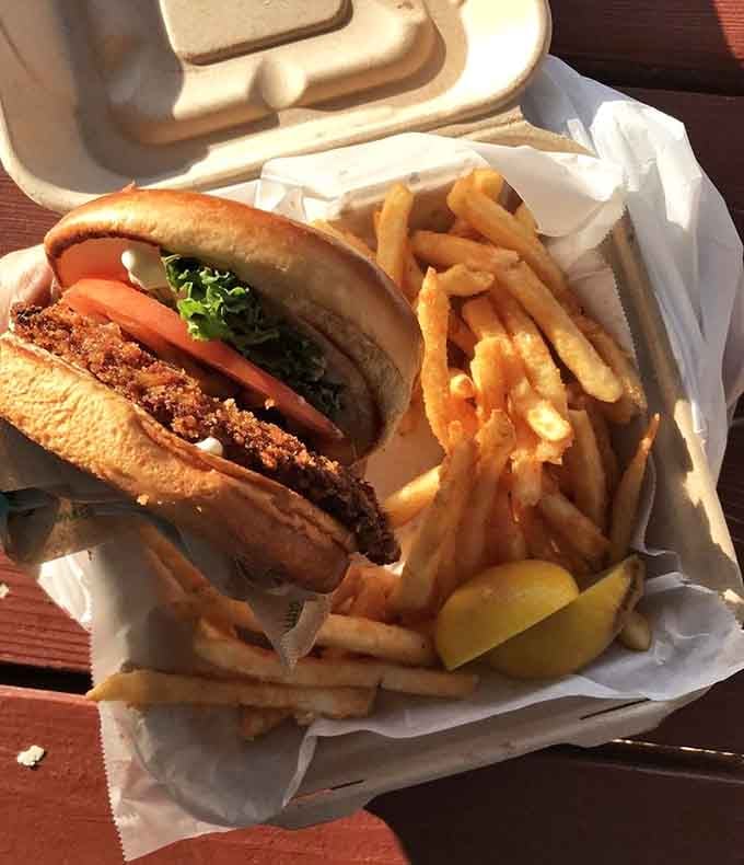 That golden-fried patty nestled in a bun proves seafood burgers don't have to be an afterthought.