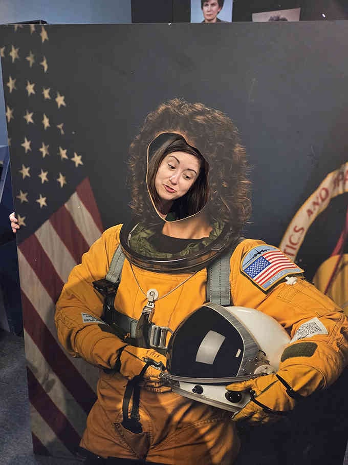 Nothing says "living your best life" quite like trying on a spacesuit and pretending you're about to fix a satellite.