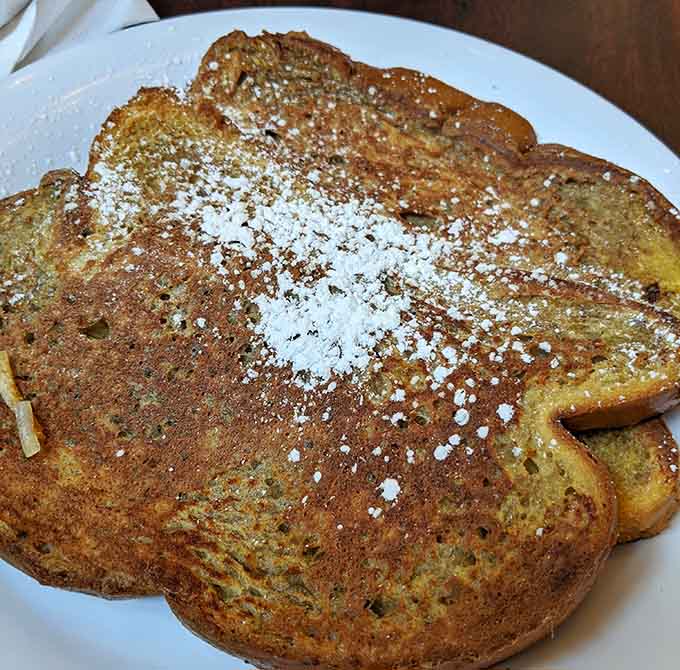 Golden, crispy edges with powdered sugar, this French toast earned its place in the breakfast hall of fame.