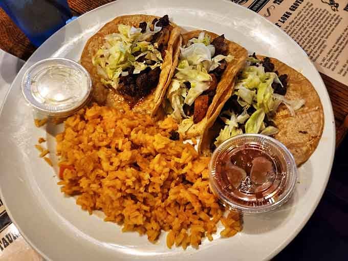 Skirt steak tacos with Spanish rice prove this historic tavern knows how to honor tradition while embracing flavor variety.