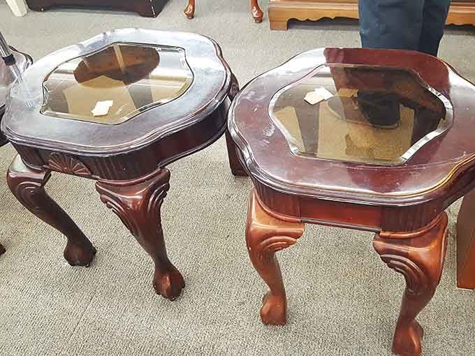 Those carved wooden legs and glass tops whisper stories of living rooms past, ready for their second act.