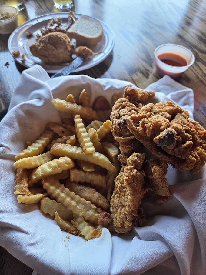 That mountain of crispy chicken and crinkle-cut fries could make a grown person weep with joy.