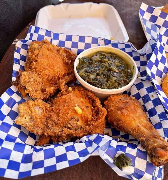 Golden, crispy fried chicken with collard greens that'll make you reconsider everything you thought about vegetables.