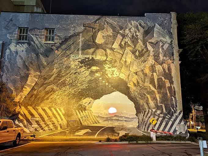 At night, this mural glows like it's auditioning for a role in a science fiction movie.