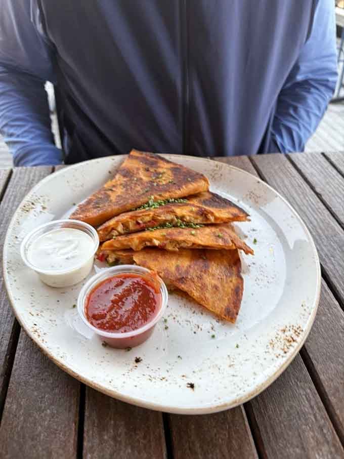 Golden, crispy quesadilla triangles stuffed with brisket prove that Texas and Mexico should collaborate more often on everything.