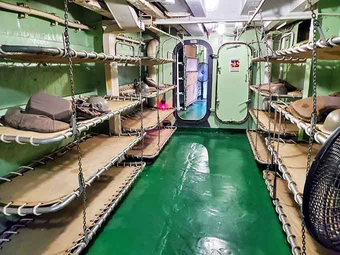 Bunks stacked like sardine cans remind you that luxury wasn't part of the World War II sailor vocabulary.