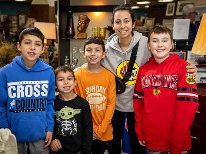 Happy treasure hunters discovering that secondhand shopping is a family sport worth mastering together every weekend.