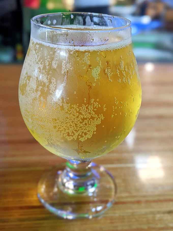 Golden and bubbly, this pineapple cider looks like sunshine decided to take liquid form for your enjoyment.