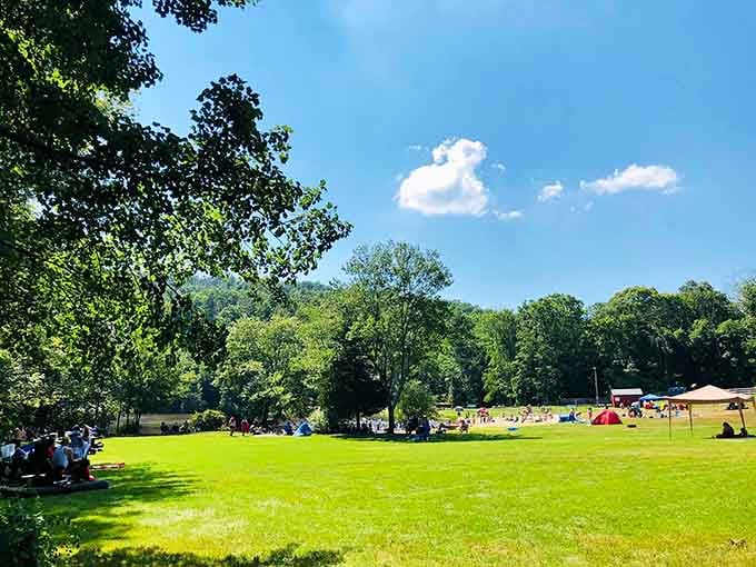 Valley Falls Park offers green space where community gatherings happen and summer days stretch out like lazy cats.