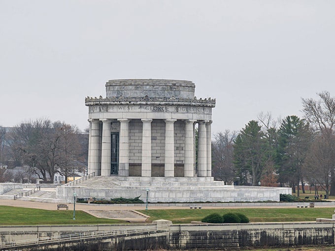 The memorial's classical columns rise like something borrowed from ancient Greece and planted beside the Wabash River.