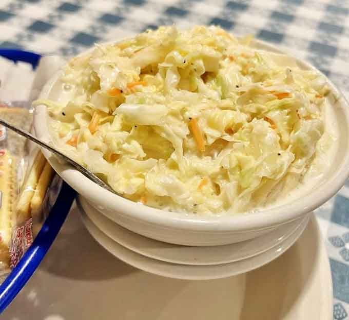 Creamy coleslaw that provides the perfect cool counterpoint to hot chicken, because balance is everything in life and dining.