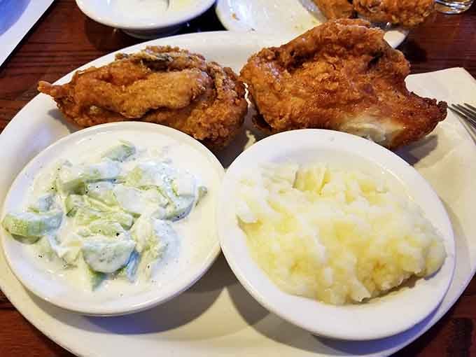 Golden fried chicken with creamy sides delivers the kind of soul-satisfying meal that makes you understand why people drive from neighboring counties.