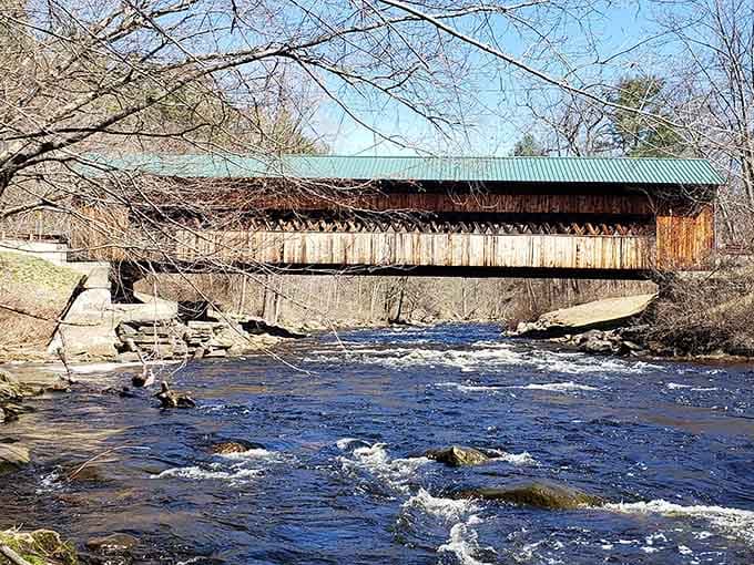 The Ware River flows peacefully beneath, completely unbothered by the engineering marvel sitting right above it for generations.