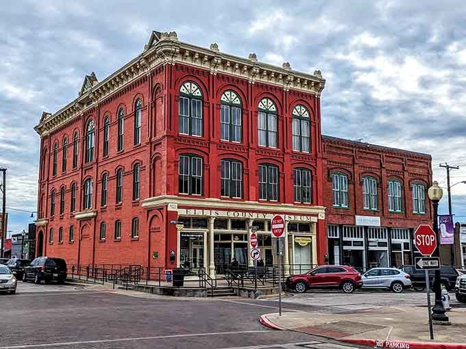 The Ellis County Museum building stands proud in red brick, holding stories and artifacts that bring local history to vivid life.