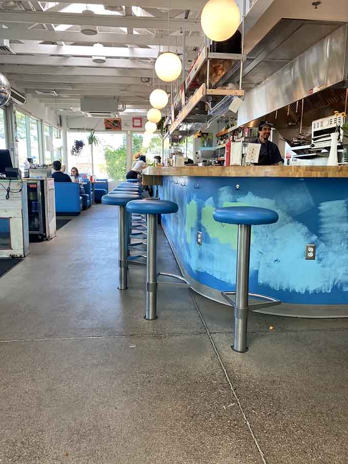 Counter seating means front-row tickets to the culinary show, complete with globe lights and good company overhead.