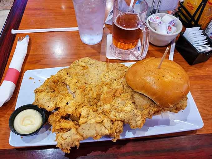 That golden-crusted tenderloin sprawling across the plate like it owns the place, because honestly, it does.