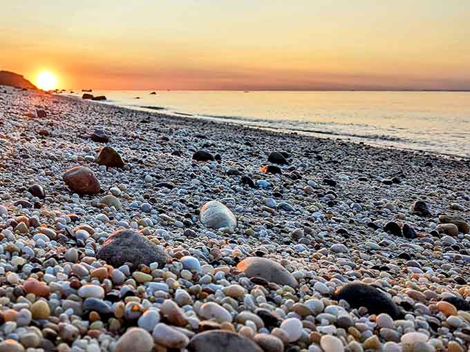 Each smooth stone on this shoreline has its own story, polished by countless tides into pocket-sized souvenirs.