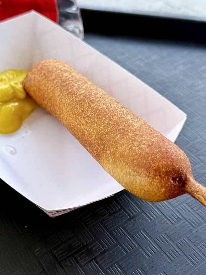 The corn dog: proof that sometimes the best ideas involve wrapping meat in cornmeal and frying it golden.