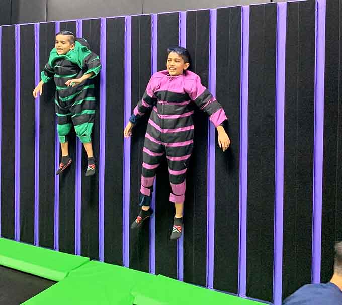 Stuck to the wall like human Post-it notes, these kids discovered gravity is more of a suggestion than a rule.