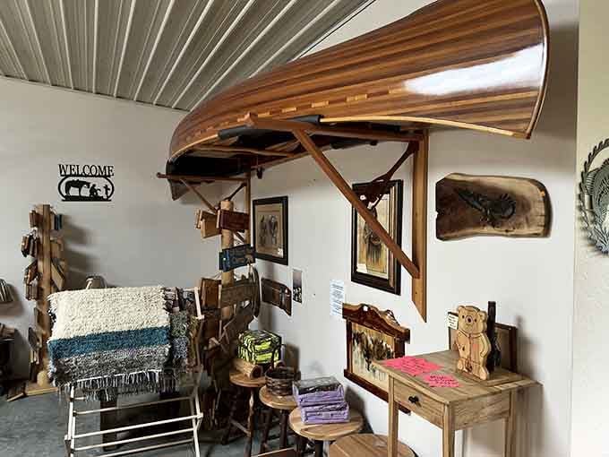 A wooden canoe suspended from the ceiling proves that even the decor here refuses to be ordinary or predictable in any way.