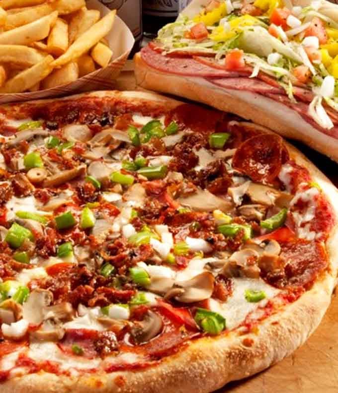 Pizza topped with enough ingredients to make you temporarily forget you came here specifically for the barbecue&mdash;temporarily being the key word.