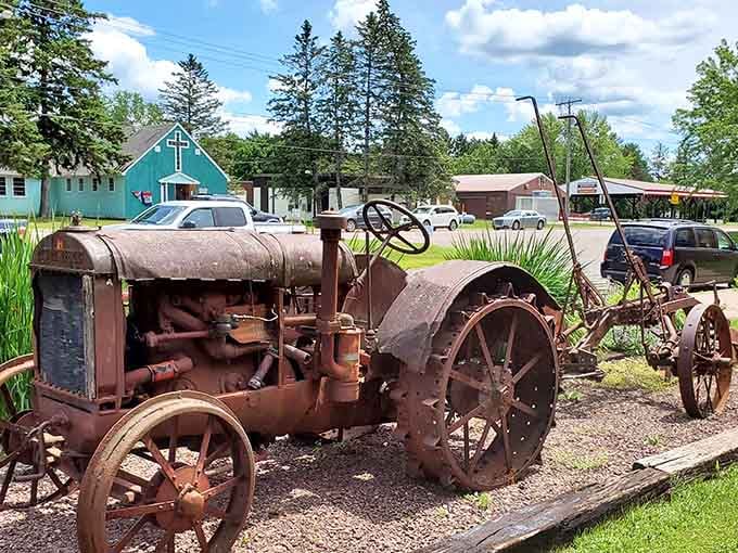 This beautifully weathered old tractor on display in Askov carries more stories per square inch than most museums ever will.