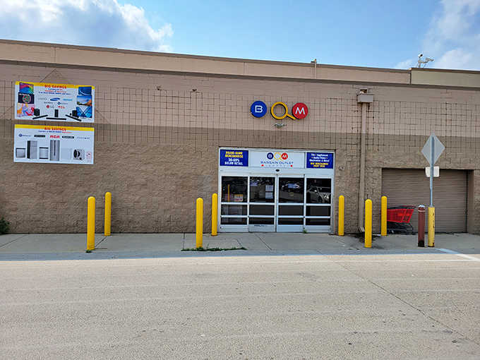 The simple "BOM" logo and yellow bollards mark the entrance to your new favorite money-saving destination.