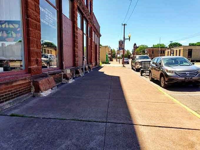Copper country's red sandstone buildings line streets where mining fortunes once built a town that still stands proud.