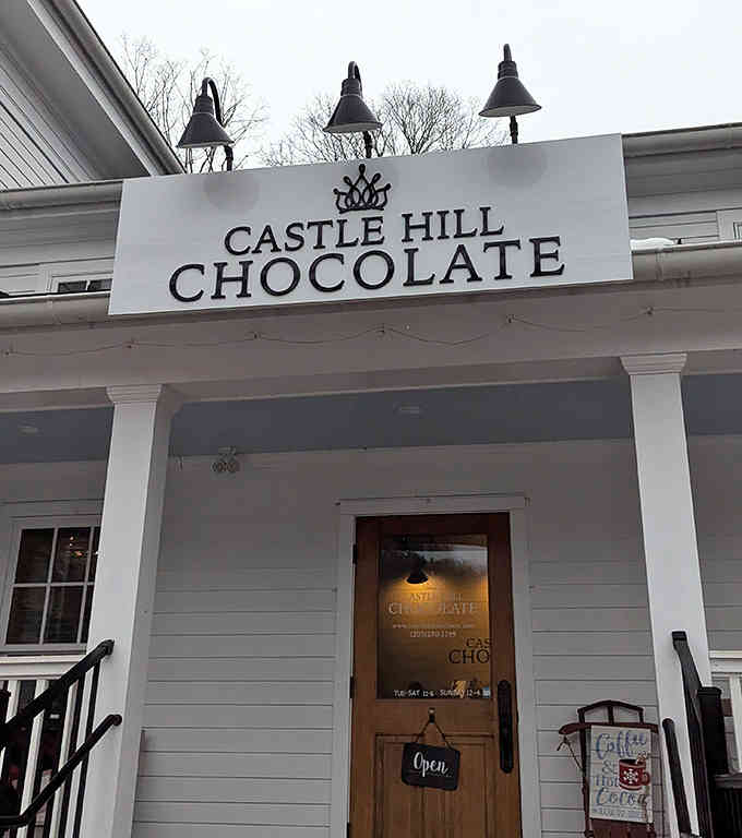 The crown logo and vintage lamps give Castle Hill an elegant charm—royalty never tasted this good or felt this welcoming.