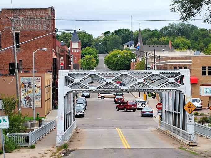 The vintage metal bridge connects both sides of town and generations of stories worth discovering on foot.