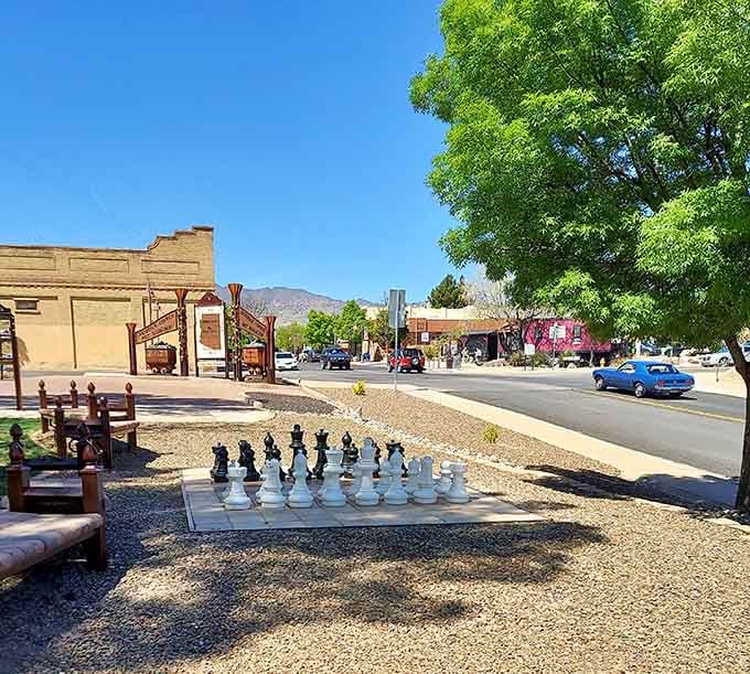That oversized chess set invites you to slow down and enjoy a strategic game under the shade.