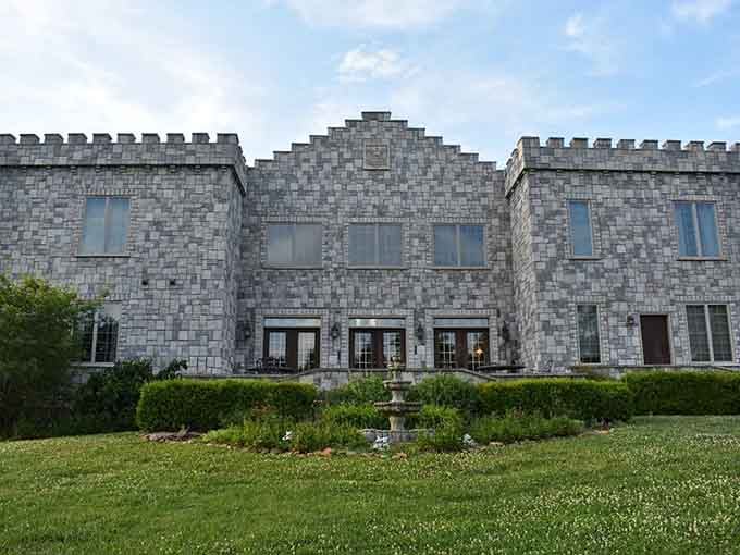 A genuine castle with battlements and towers sits on a hilltop, looking like it teleported from medieval Europe.