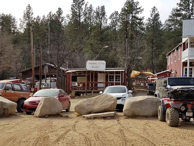 Giant boulders guard the entrance to this mountain hideaway where pine trees replace cacti and pavement.