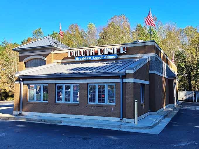 Classic brick and big windows under morning light&mdash;this is what every neighborhood diner should look like.