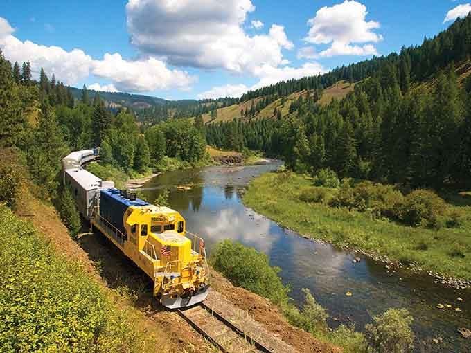 That bright yellow locomotive snaking along the river makes Big Bird look positively understated by comparison.