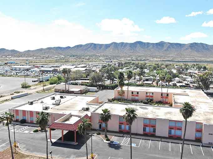 Wide open desert views stretch toward mountains, proving that budget-friendly doesn't mean sacrificing natural beauty or space.