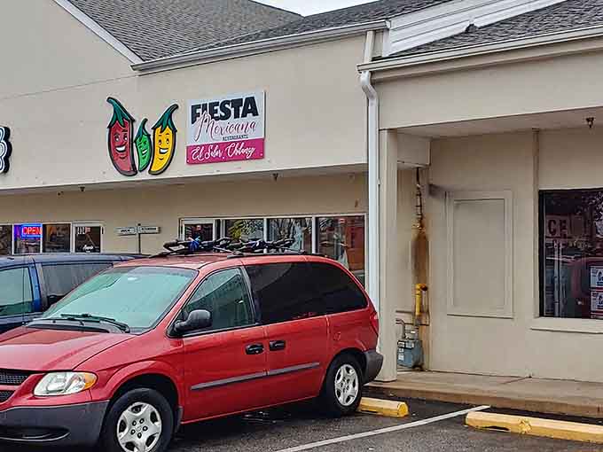 Those three smiling peppers above the door are basically the Rat Pack of vegetable mascots welcoming you in.