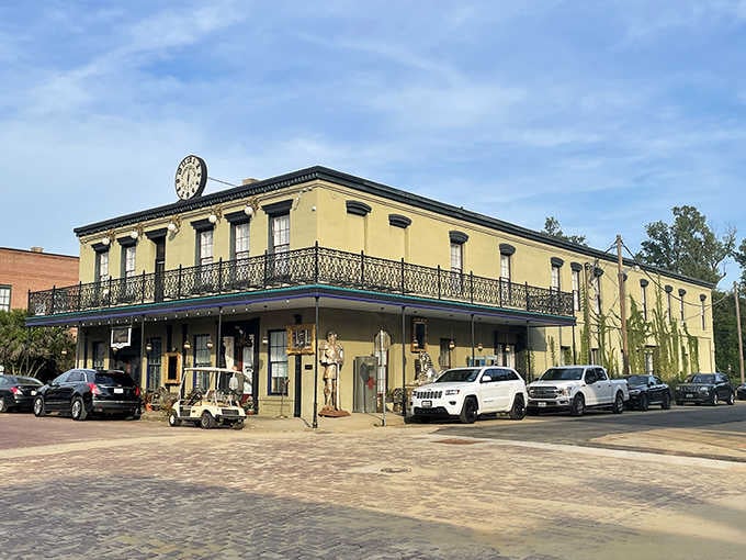 Historic brick buildings wear their age proudly, each weathered facade telling tales of riverboat days and cotton trades.