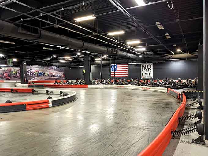 The "No Speed Limit" sign tells you everything about this underground racing paradise where throttle rules supreme.