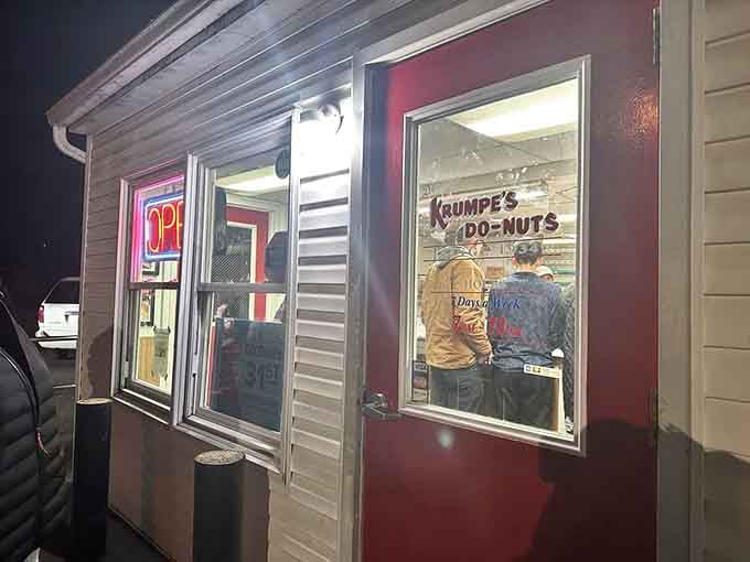 When that neon OPEN sign glows after dark, night owls know fresh cake donuts are being made right now.
