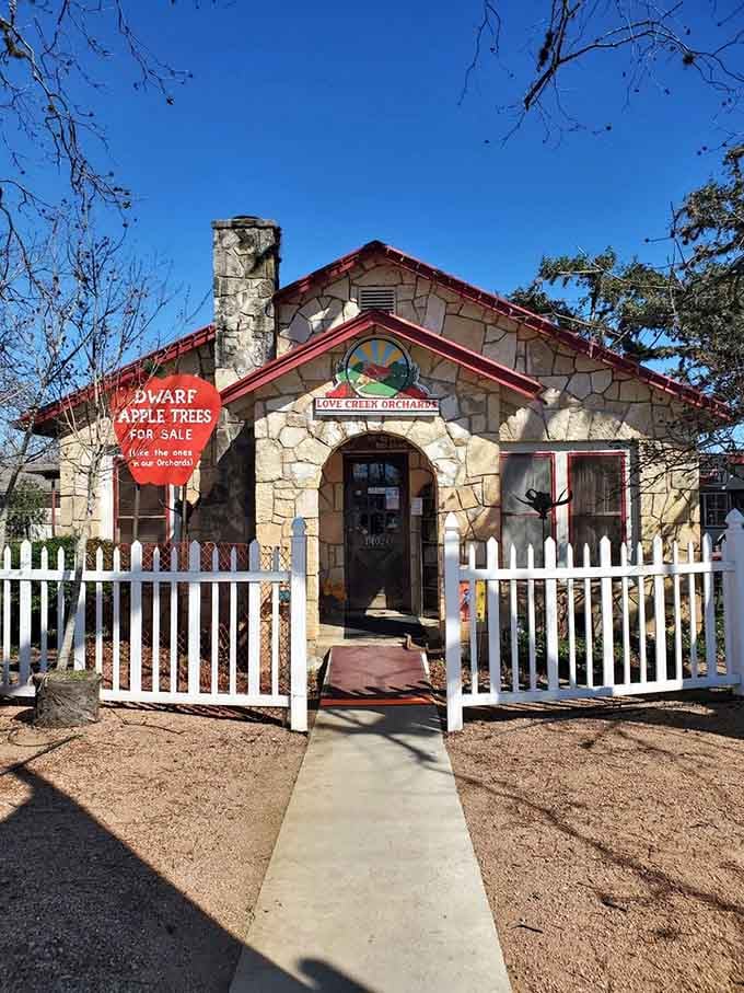 That charming stone cottage with the white picket fence could be Snow White's retirement home, but it's actually your apple-picking headquarters.