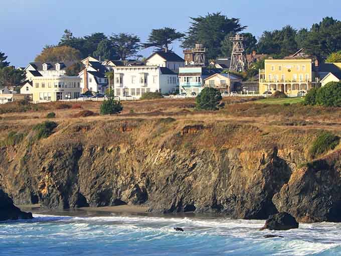 Victorian homes perched on coastal bluffs create a postcard scene that Hitchcock himself couldn't have staged better.